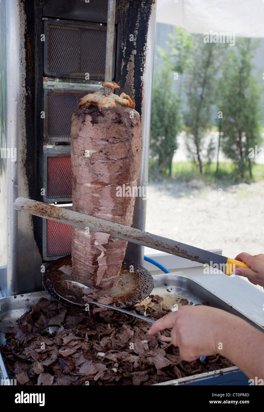 Chef slicing Turkish doner kebab Stock Photo - Alamy