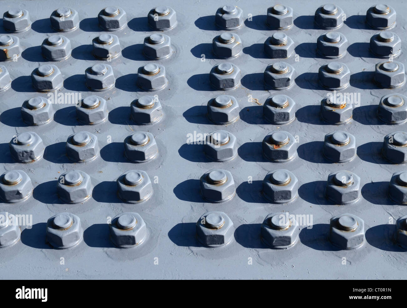 Metal bridge strengthening elements. Many bolts and nuts Stock Photo ...