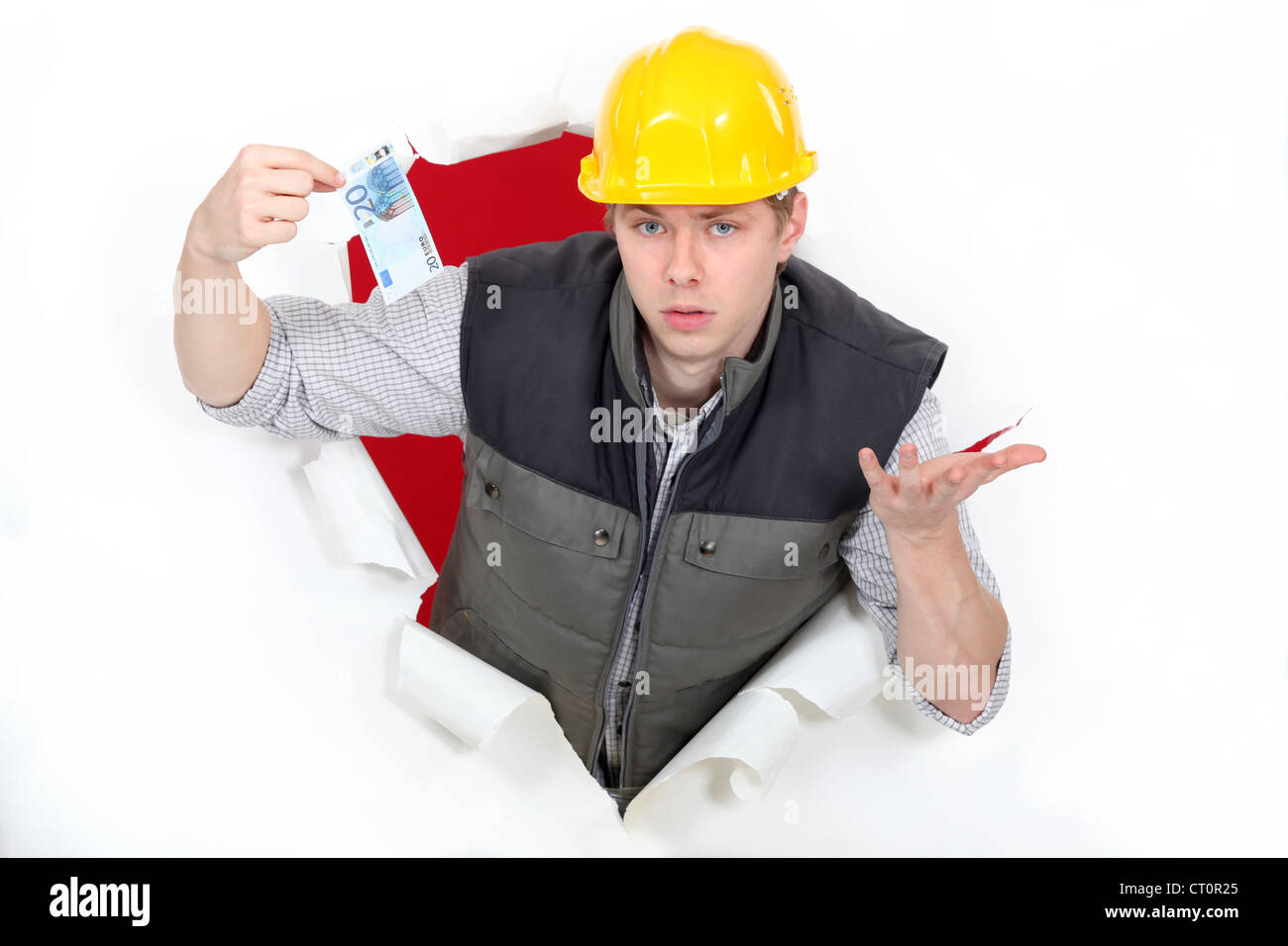 Men coming out of hole paper ticket in hand Stock Photo - Alamy