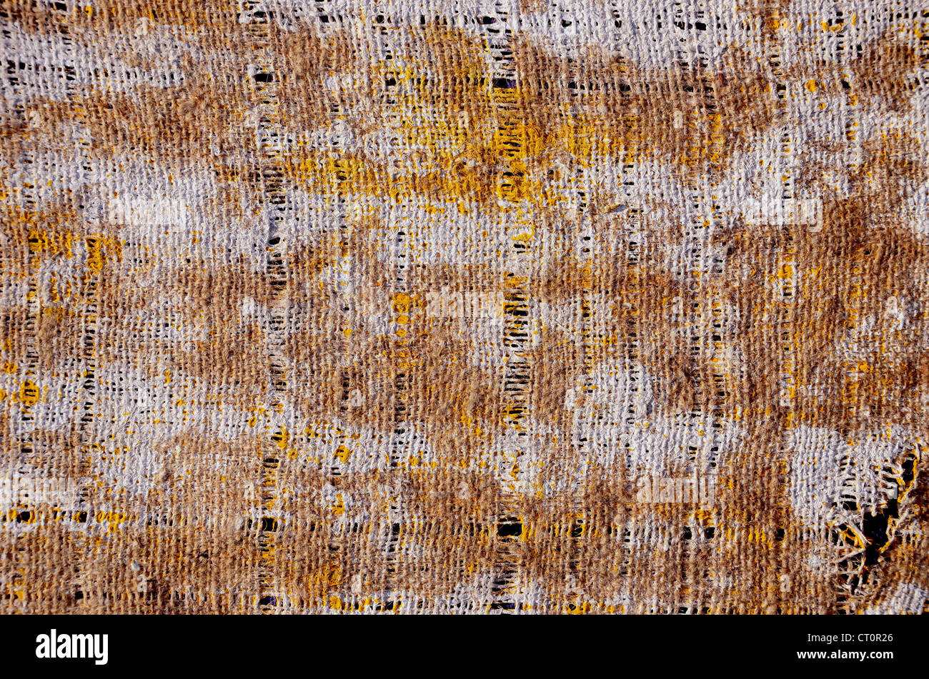 Vintage background. Very old material texture with holes in it Stock ...