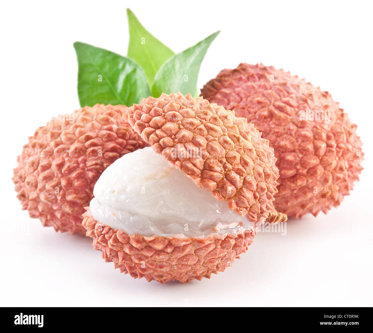 Lychee with leaves on a white background Stock Photo - Alamy