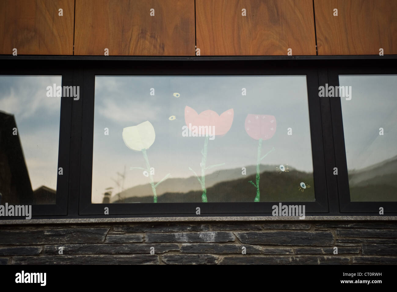 Window of a nursery school in rural area Stock Photo - Alamy