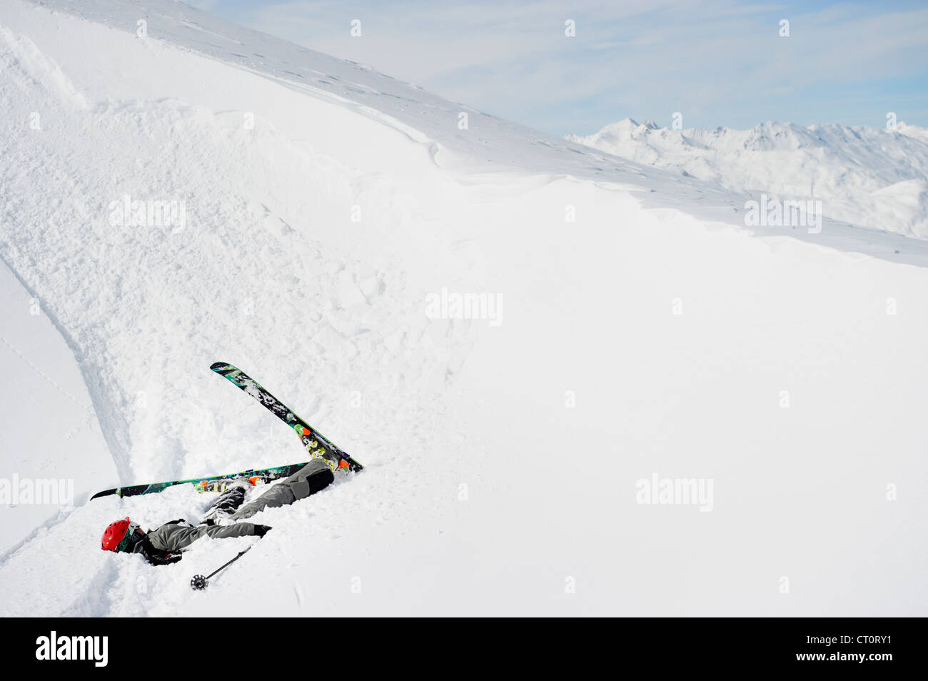 Skier doing flip on snowy slope Stock Photo - Alamy