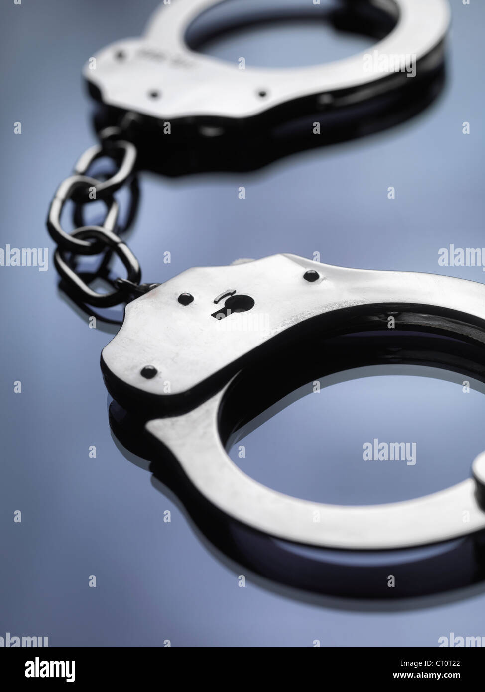 Close up of metal handcuffs Stock Photo - Alamy