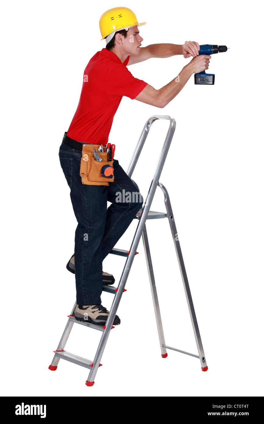 Man using battery powered drill hi-res stock photography and images - Alamy