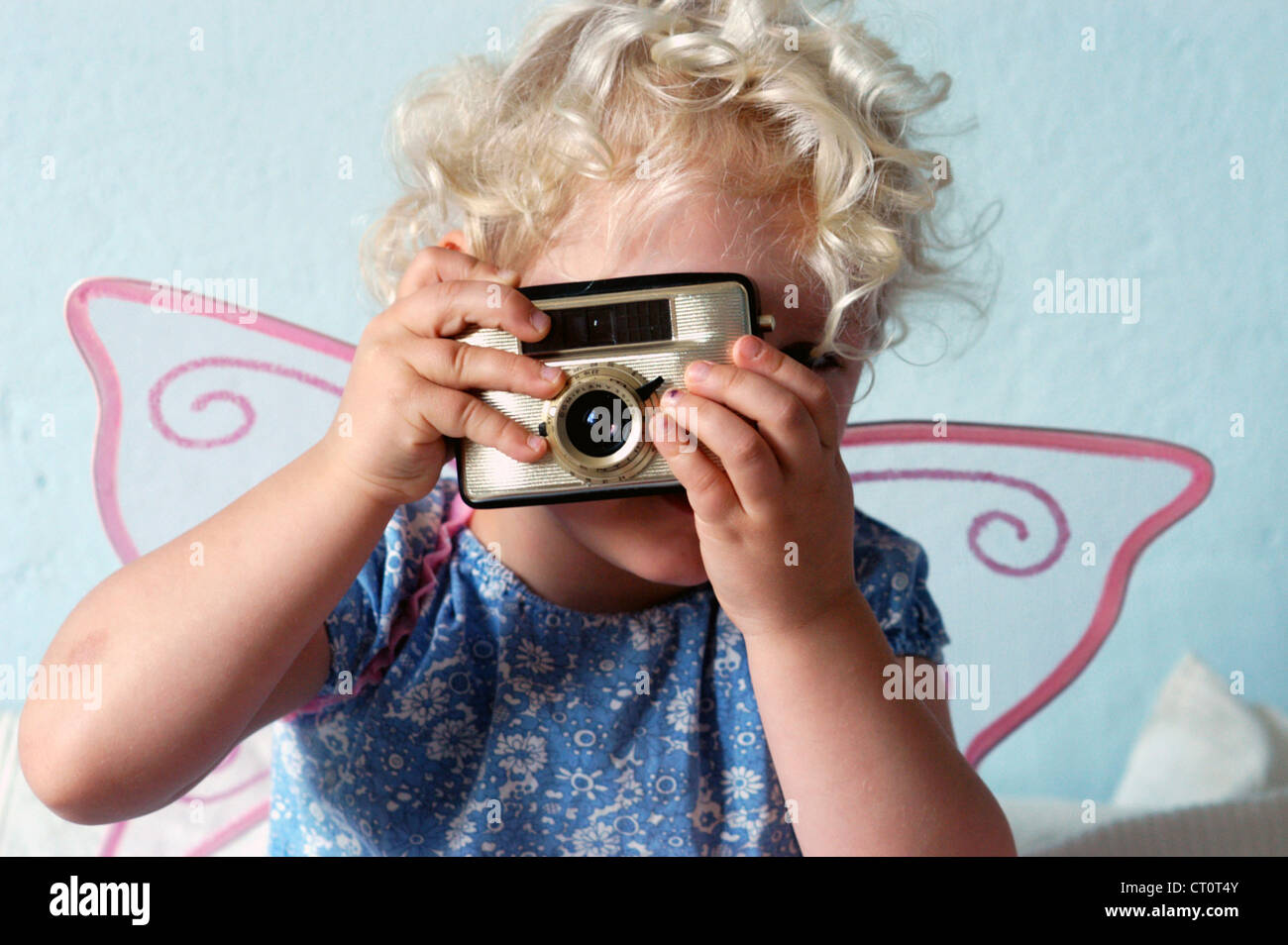 Child playing with camera, Berlin Stock Photo - Alamy