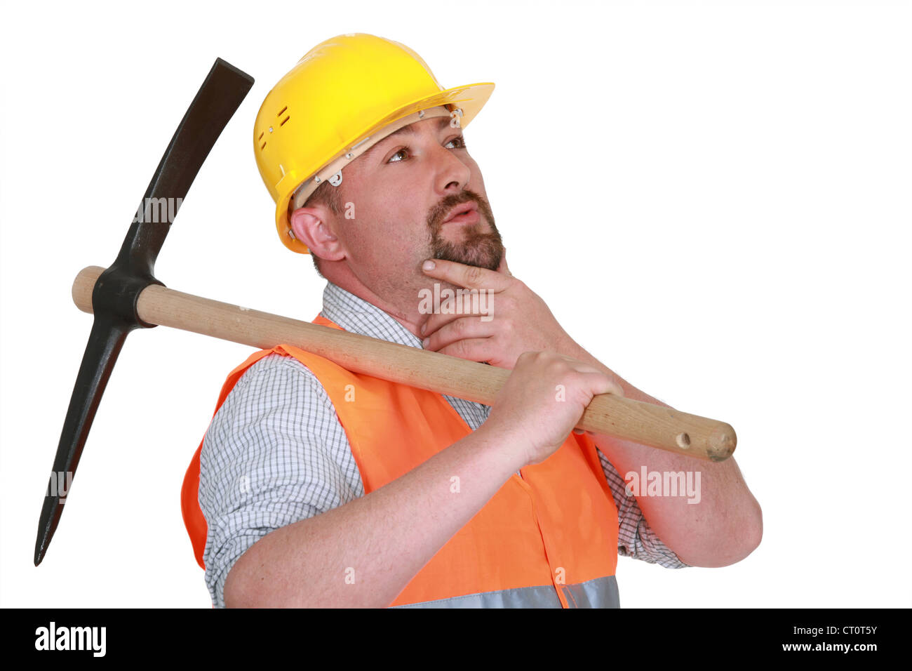 Pensive man with pick ax Stock Photo - Alamy