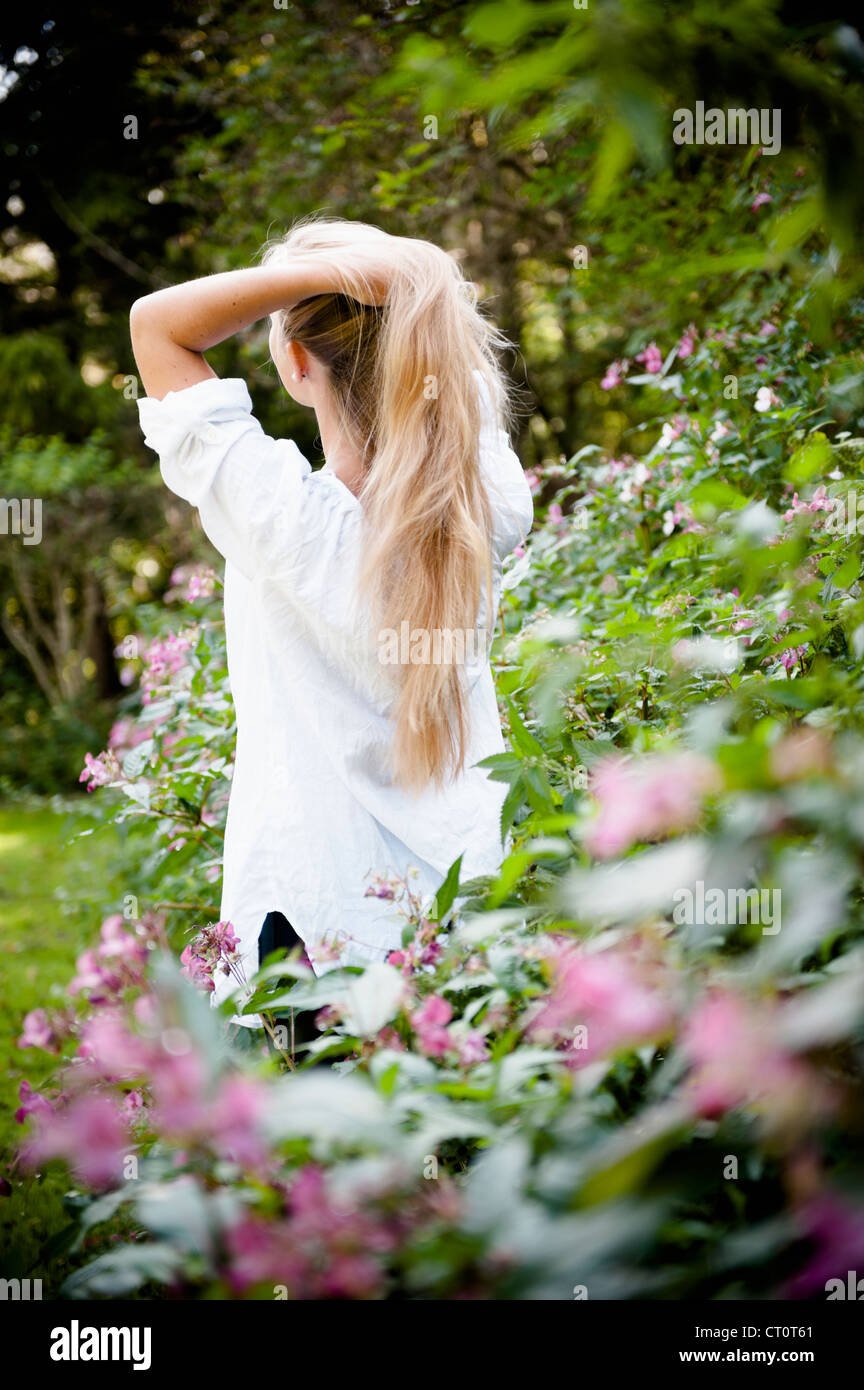 Woman Behind Bush High Resolution Stock Photography and Images - Alamy