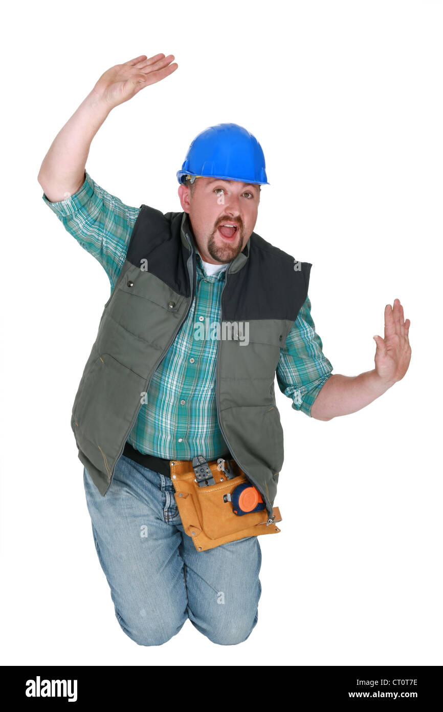 Trapped construction worker Stock Photo - Alamy