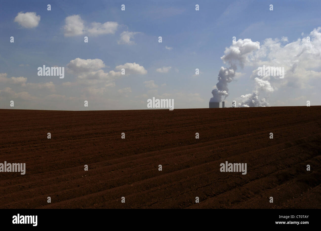 Lignite power plant behind a field, NRW Stock Photo - Alamy