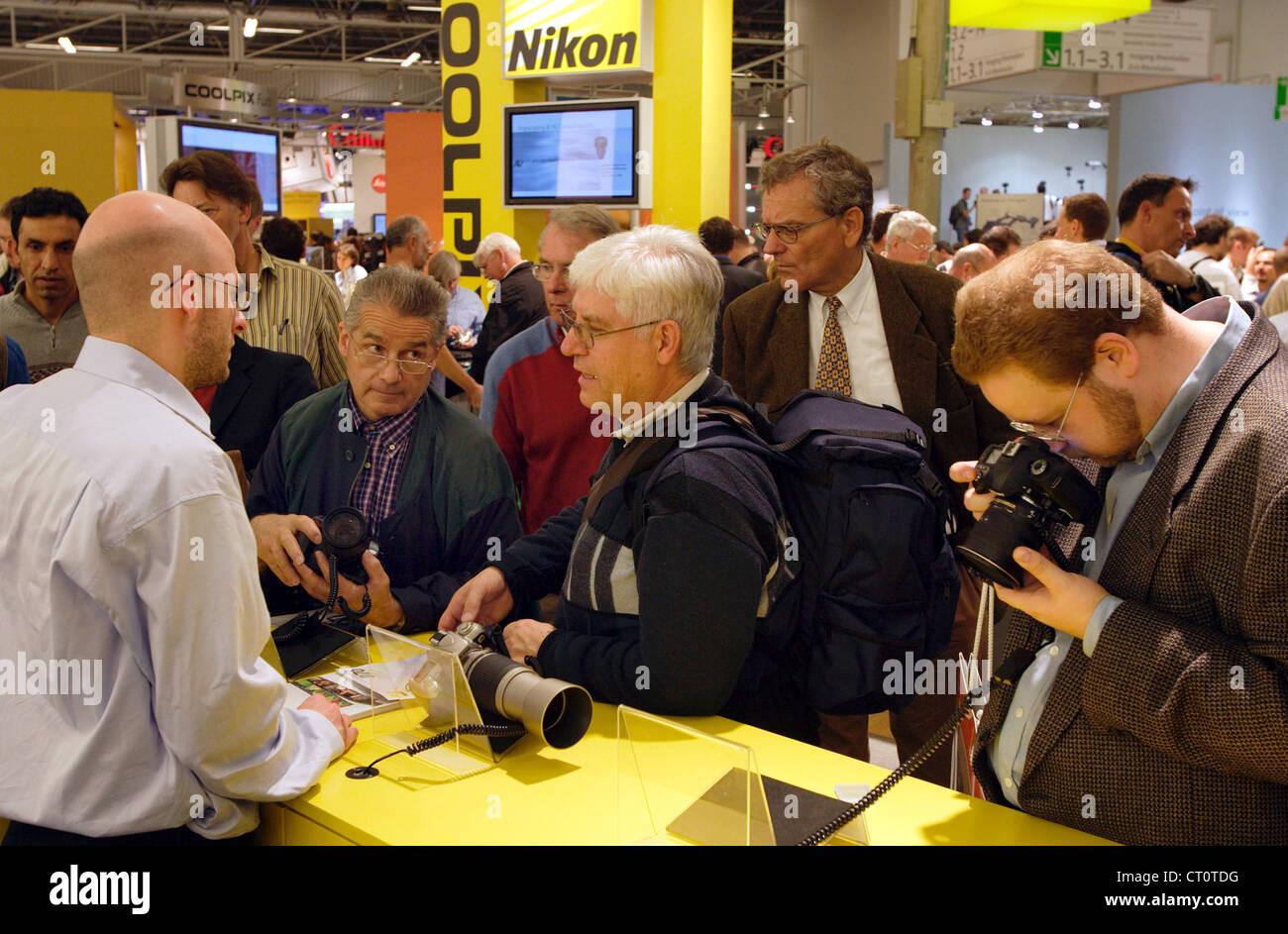 Cologne, Photokina, visitors at the Canon booth Stock Photo - Alamy