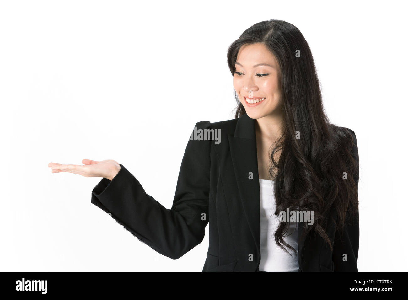 Woman holding out hand to show something Stock Photo - Alamy