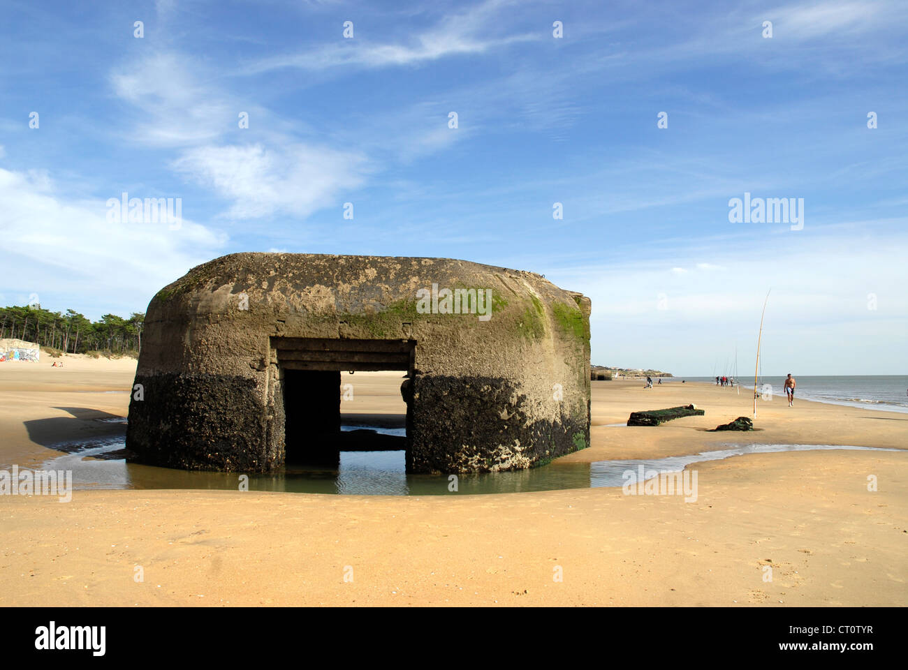 Blockhouse of wold war II on the beach at low tide at Saint-Palais in ...