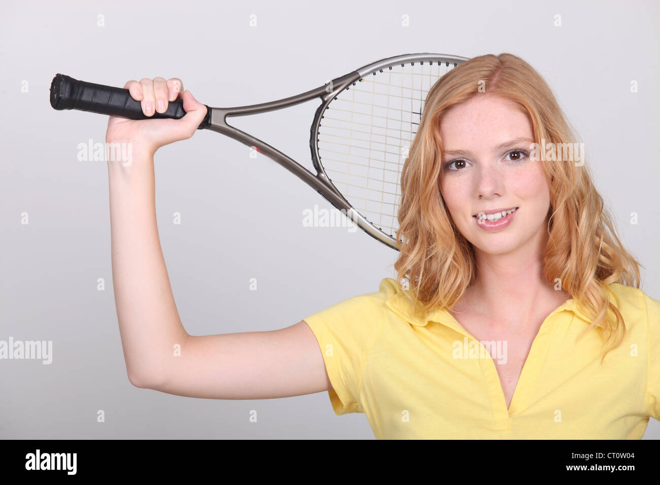potrait of a woman with tennis racket Stock Photo - Alamy