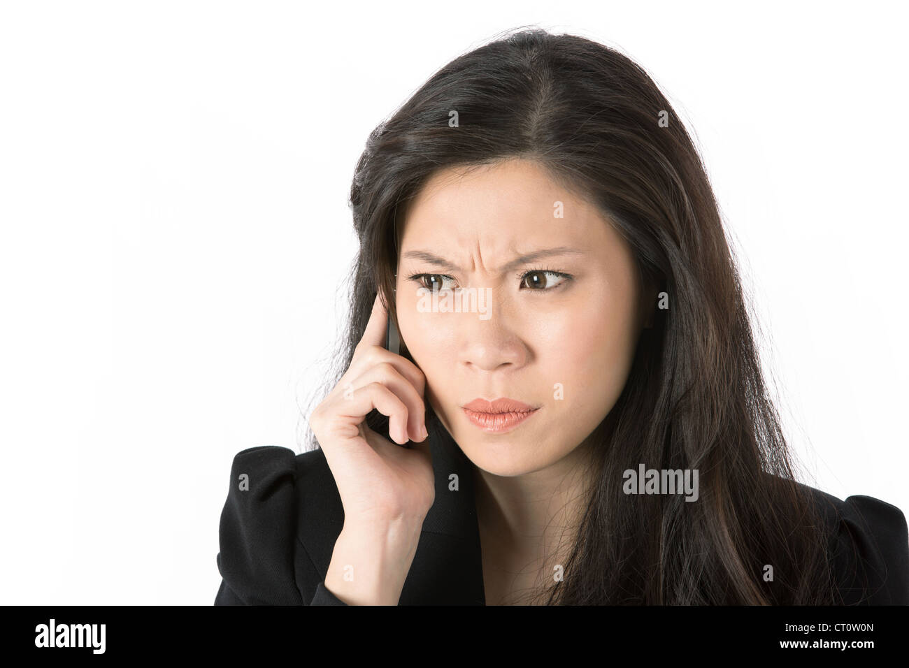Angry businesswoman talking on phone Stock Photo - Alamy