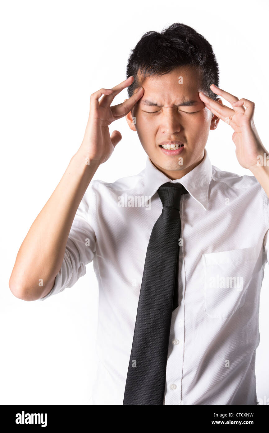 Man holding his head in distress Stock Photo - Alamy