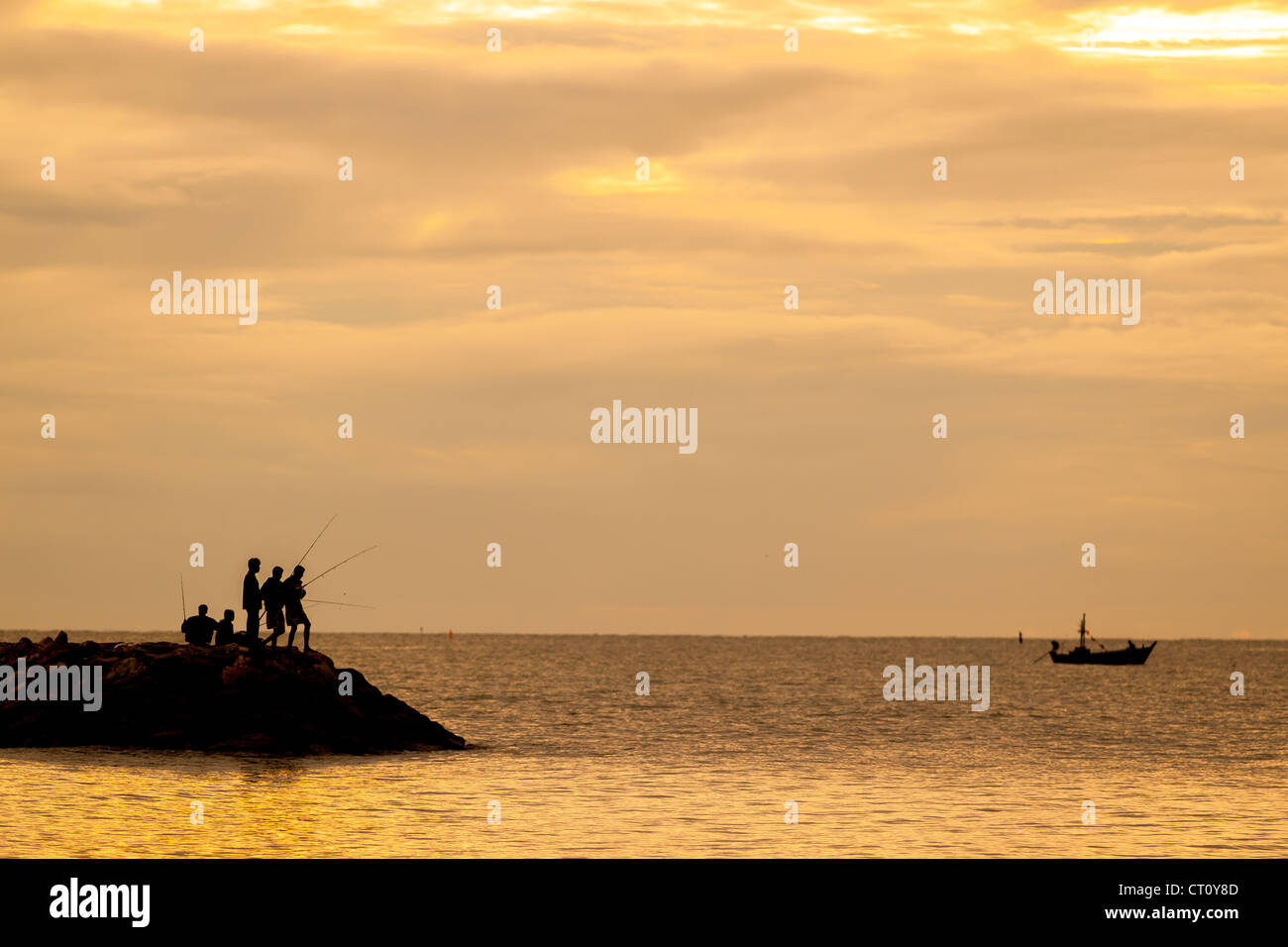 Angler's shadow in morning sun , thailand Stock Photo - Alamy