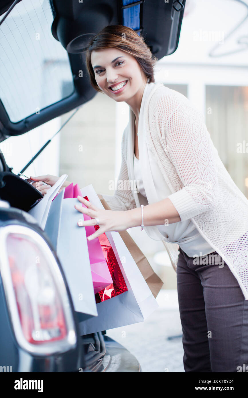 Female shopper loading car hi-res stock photography and images - Alamy