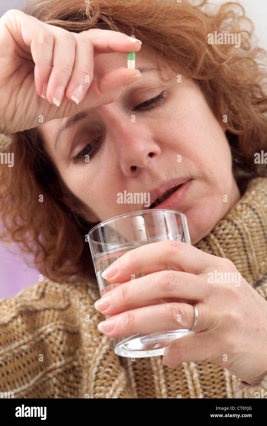ELDERLY PERSON TAKING MEDICATION Stock Photo - Alamy