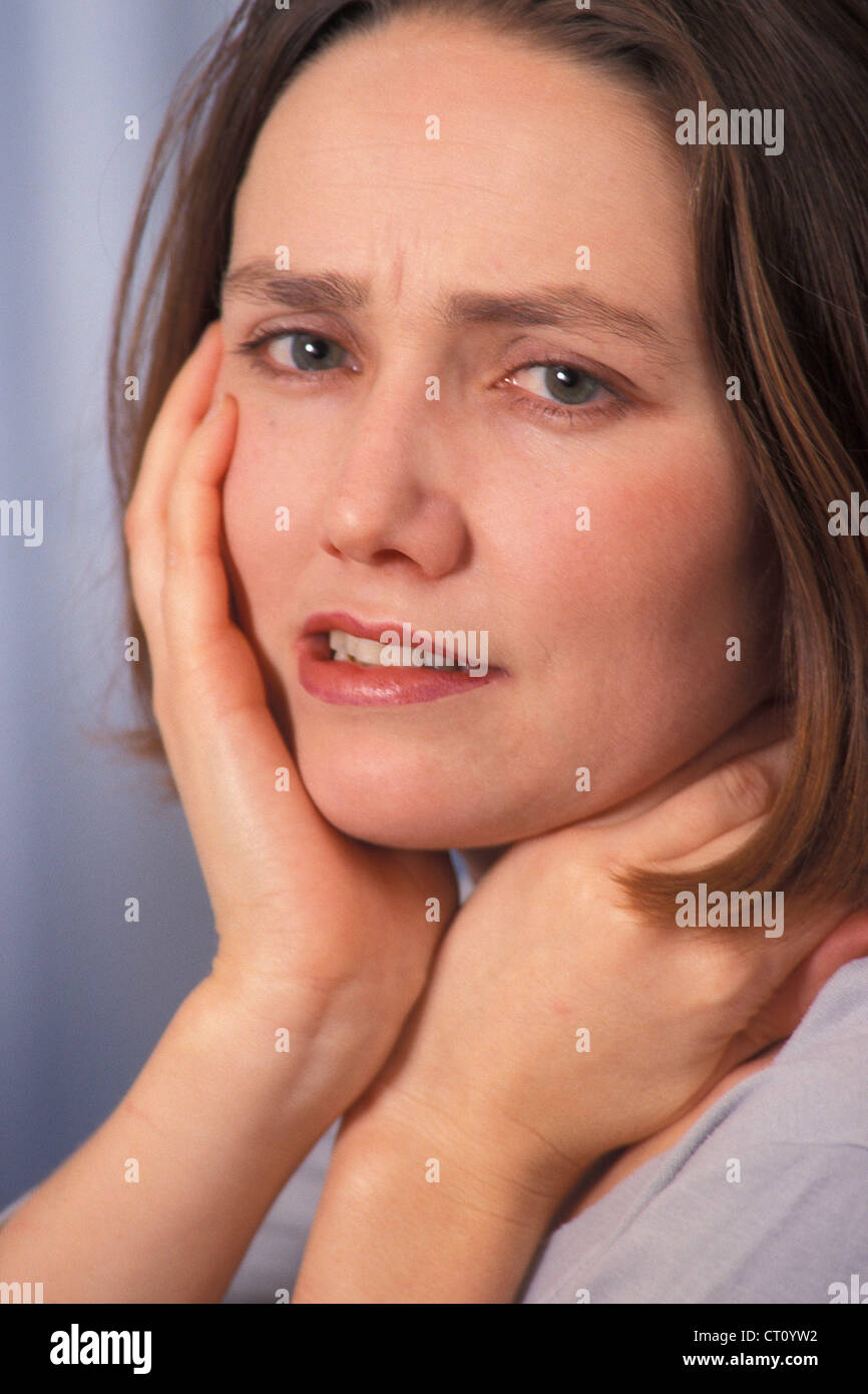 PAINFUL TOOTH IN A WOMAN Stock Photo - Alamy