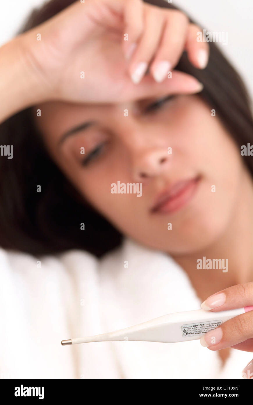 WOMAN WITH FEVER Stock Photo - Alamy