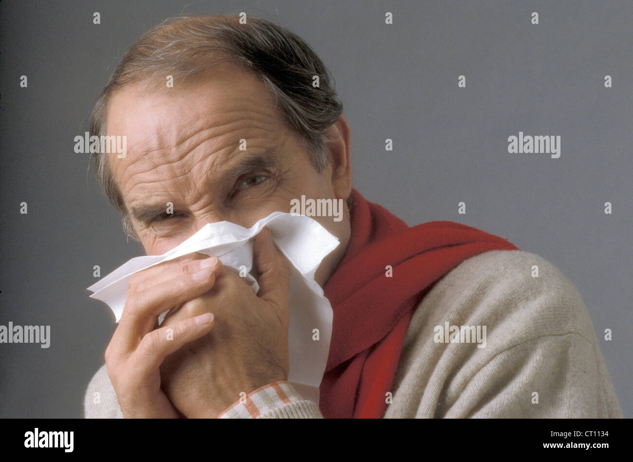 ELDERLY PERSON WITH RHINITIS Stock Photo - Alamy