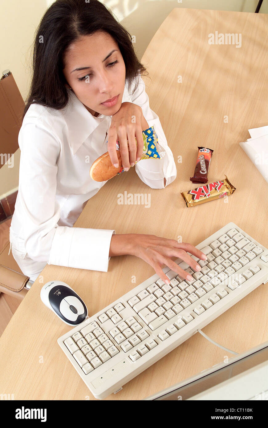 One woman bored eating hi-res stock photography and images - Alamy