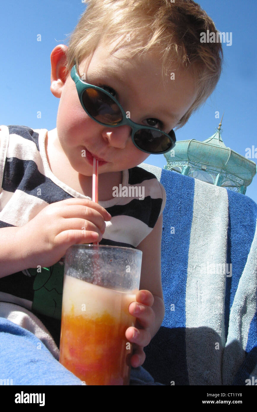 CHILD WITH COLD DRINK Stock Photo - Alamy