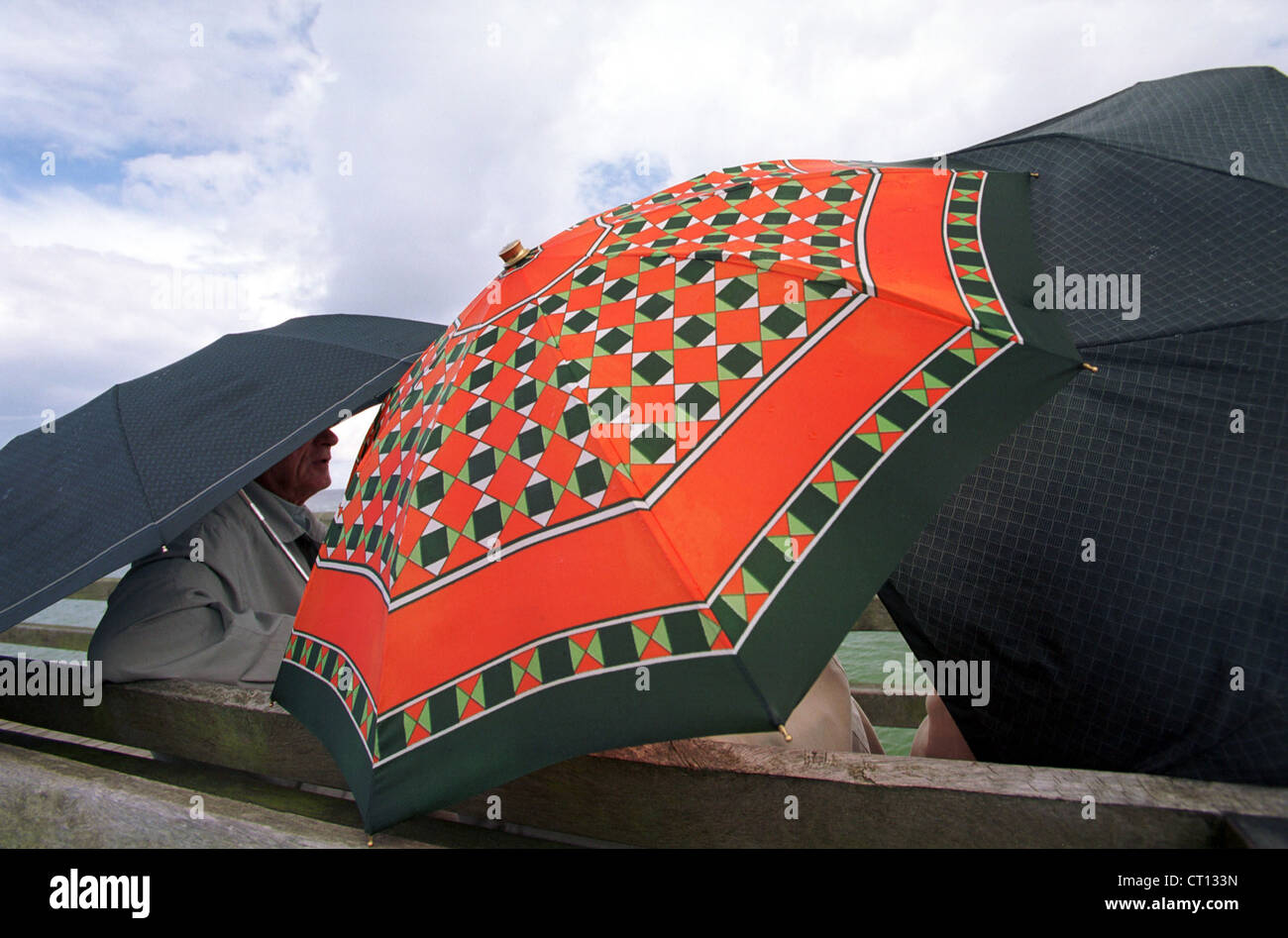 Under umbrellas hi-res stock photography and images - Alamy