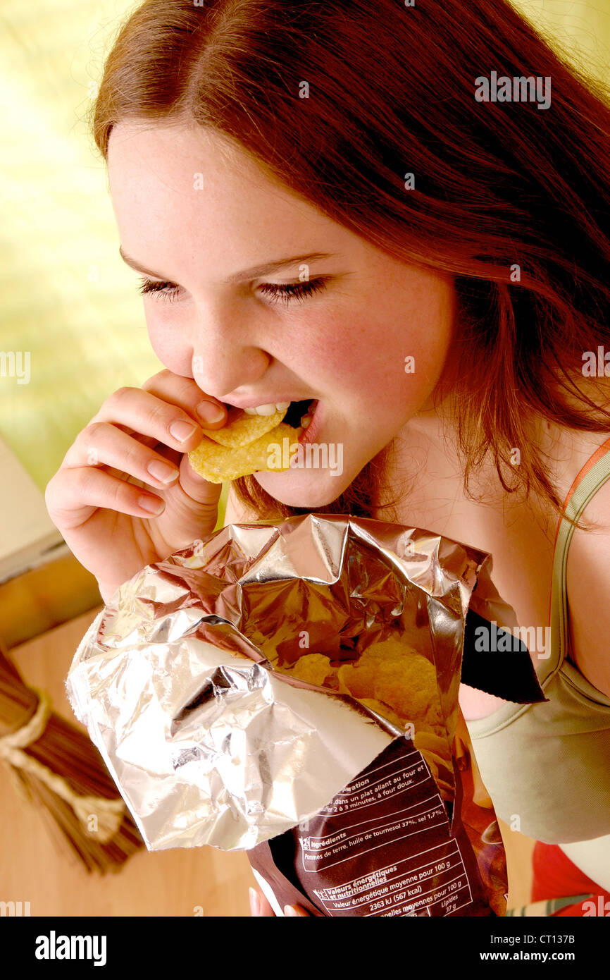 AN ADOLESCENT EATING Stock Photo - Alamy