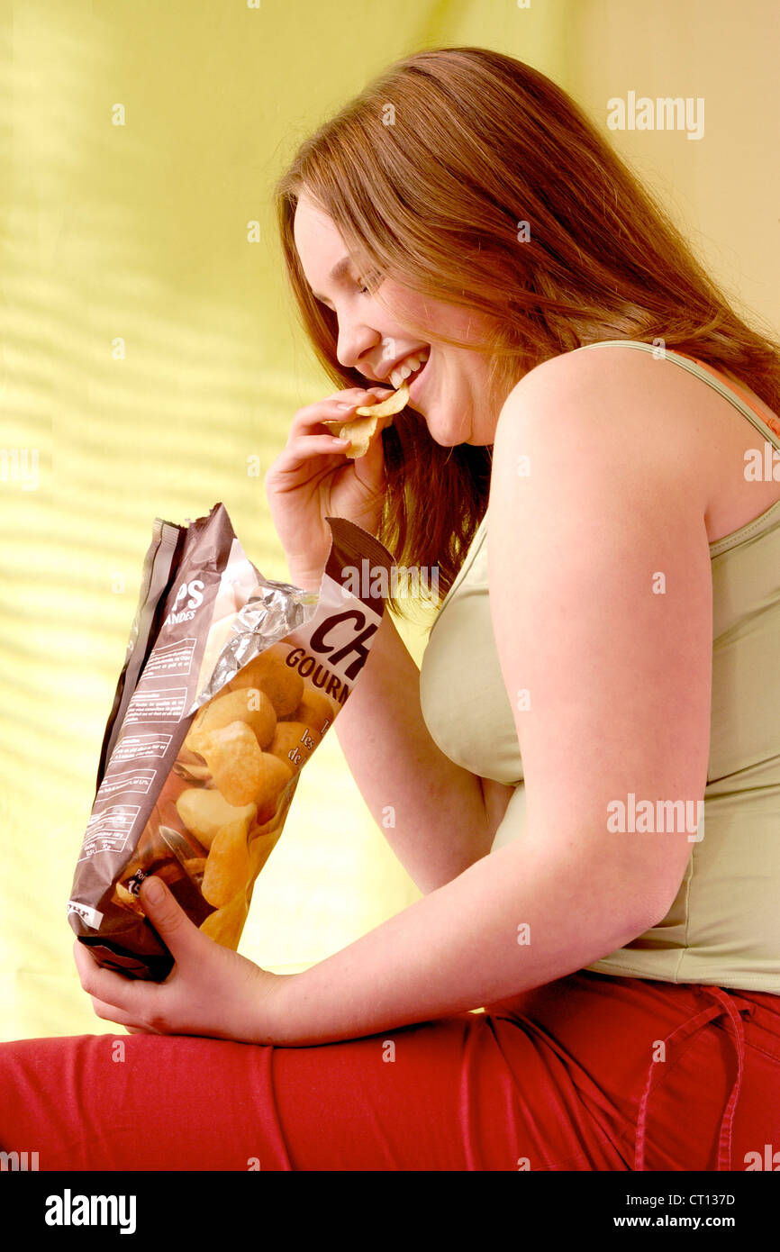 AN ADOLESCENT EATING Stock Photo - Alamy