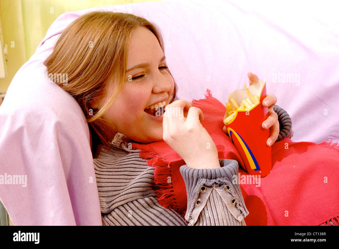AN ADOLESCENT EATING Stock Photo - Alamy