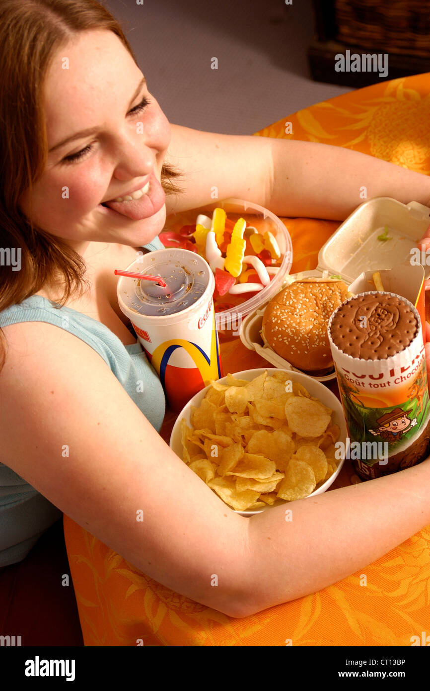 AN ADOLESCENT EATING Stock Photo - Alamy