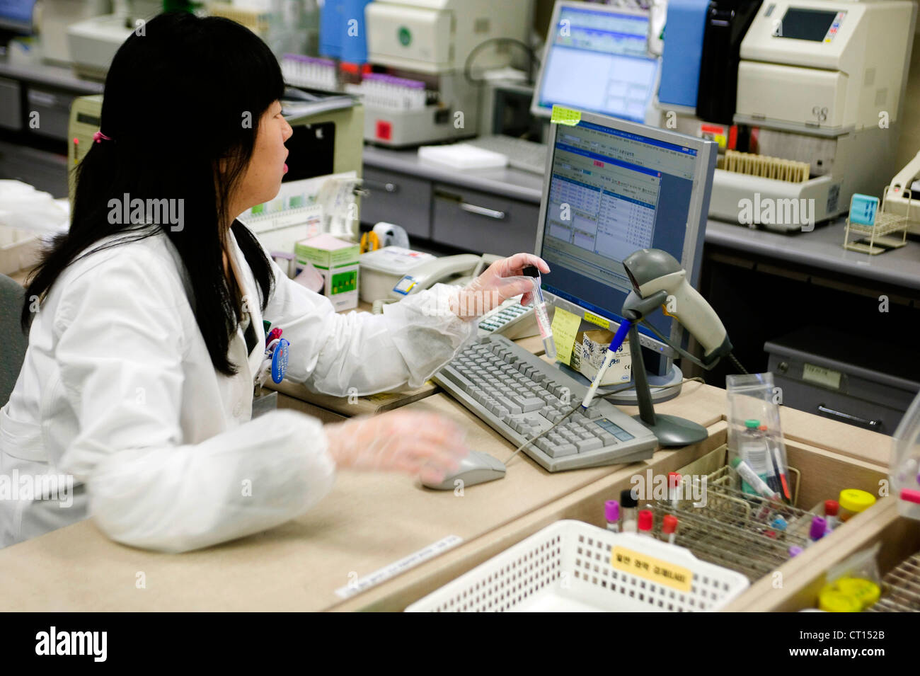Technician analyzing blood sample hi-res stock photography and images ...