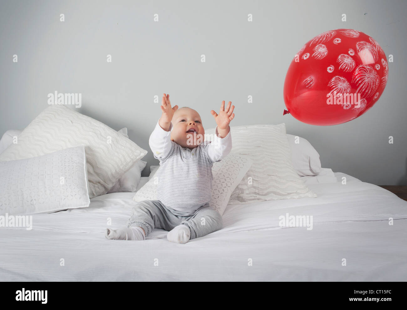 Baby reaching for object hi-res stock photography and images - Alamy