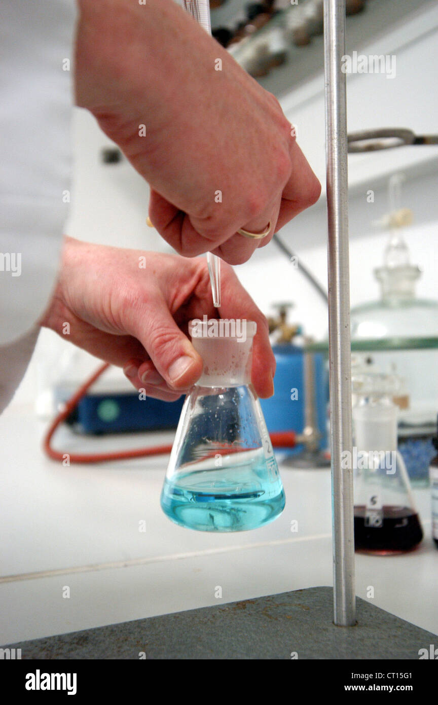 Mixing of drugs in large pharmacy Stock Photo - Alamy