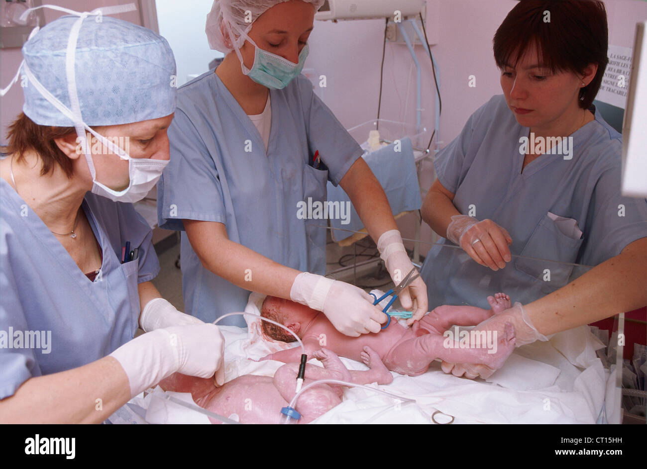 Nurse examining new born baby hi-res stock photography and images - Alamy