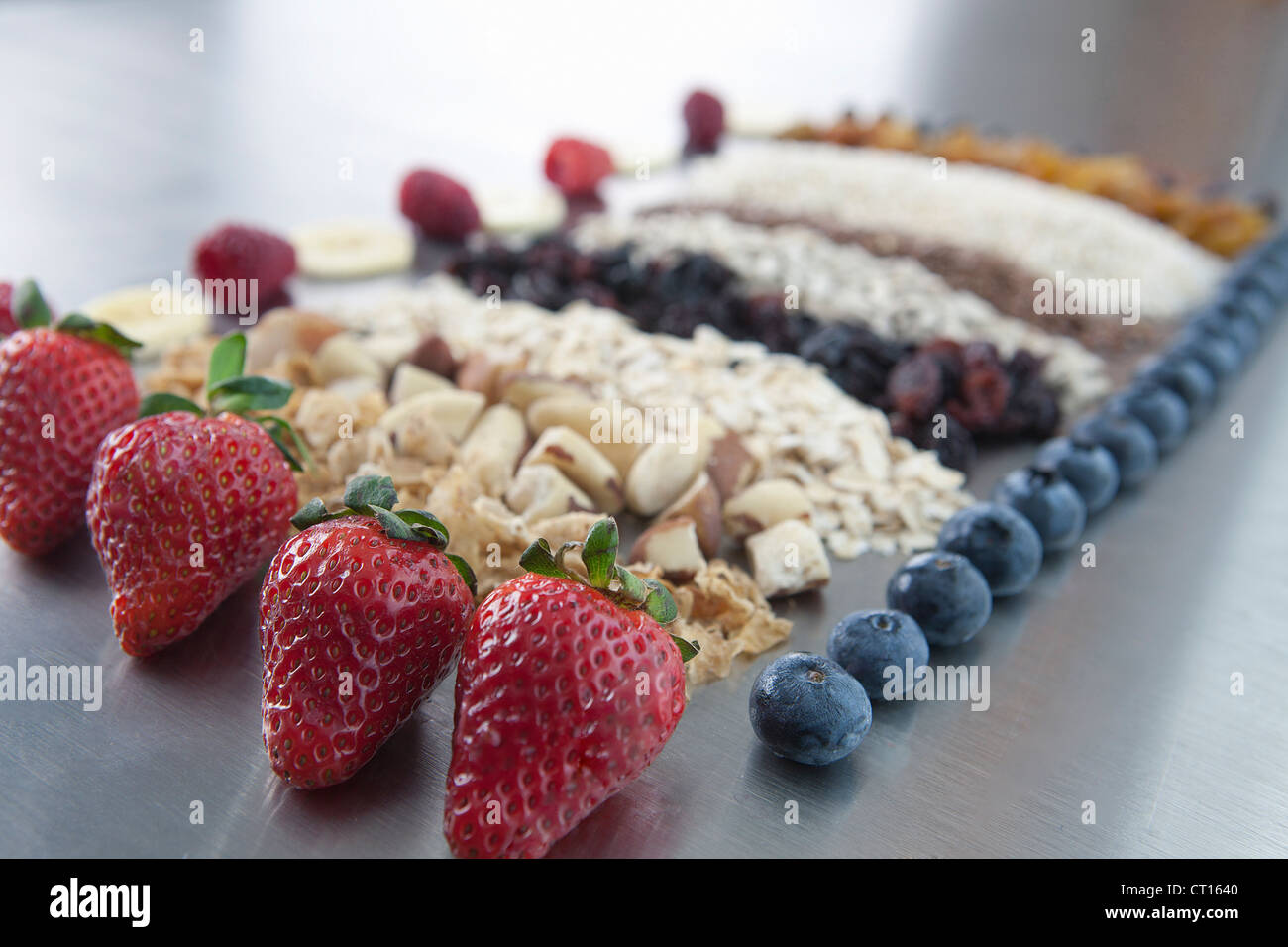 Raw nuts, fruit and grains Stock Photo - Alamy