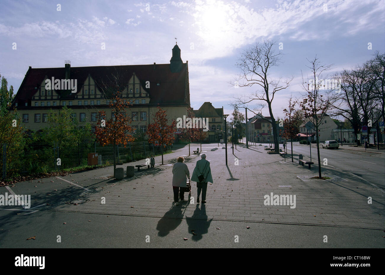 Schkeuditz, town hall and two senior Stock Photo - Alamy