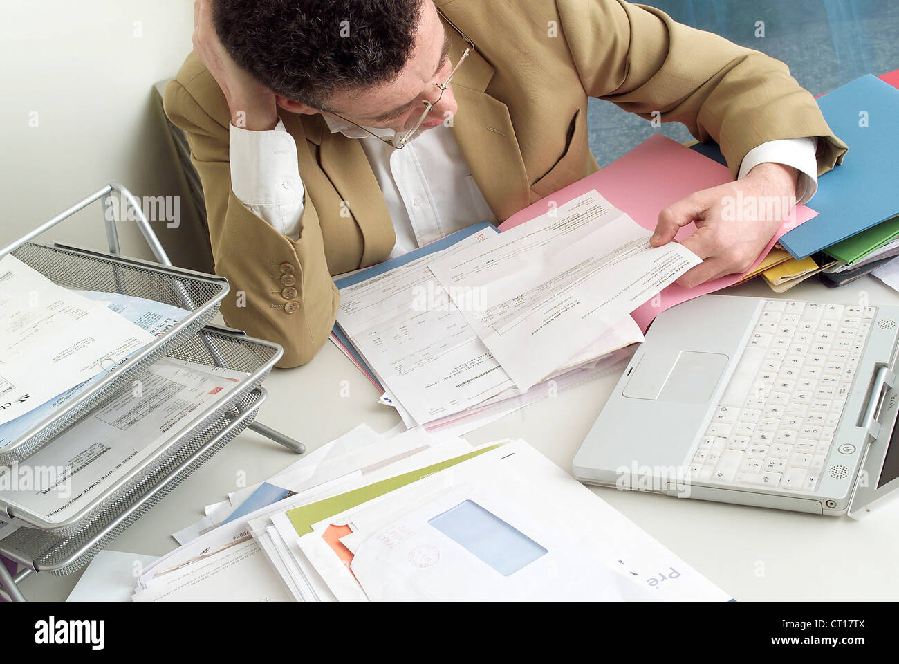 Senior man tax forms hi-res stock photography and images - Alamy