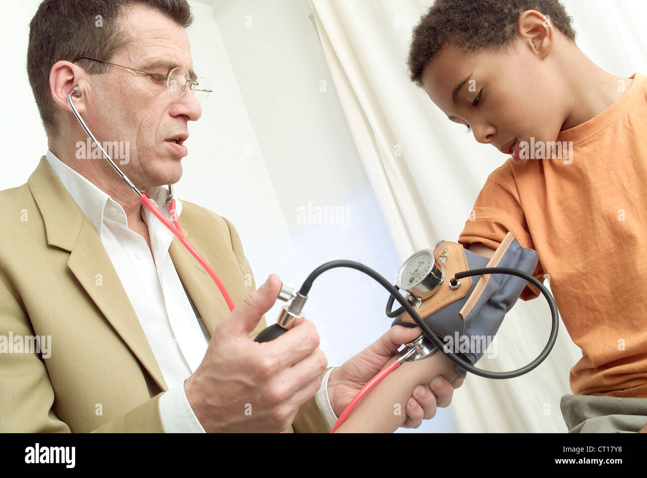 BLOOD PRESSURE, CHILD Stock Photo - Alamy
