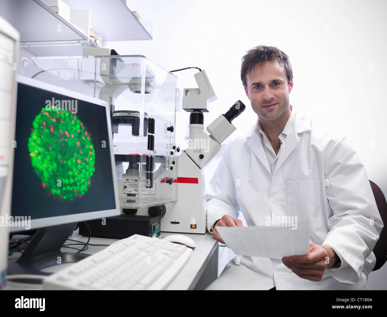 Microscope in front of cell hi-res stock photography and images - Alamy