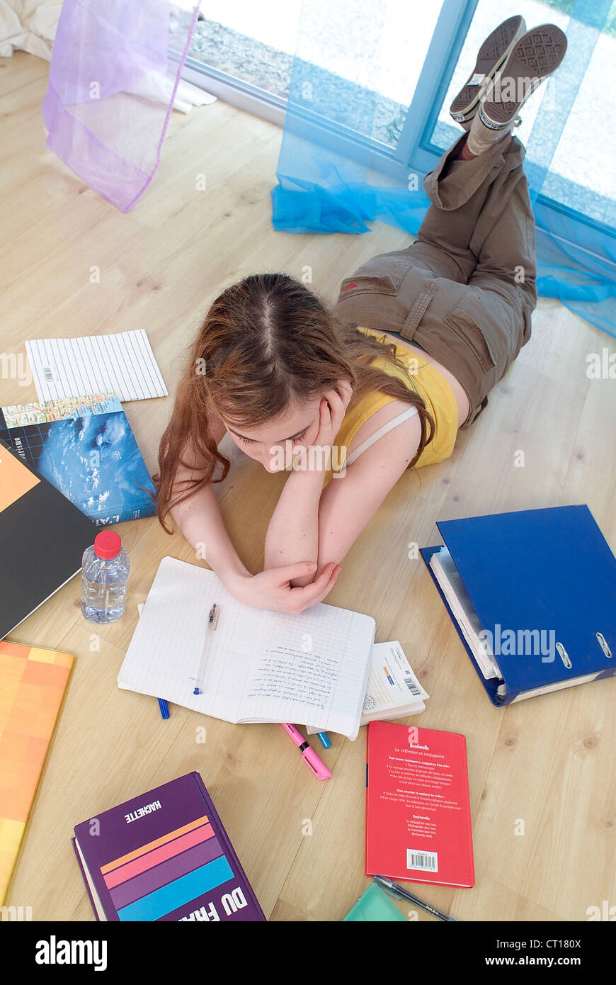 TEENAGER DOING HOMEWORK Stock Photo - Alamy