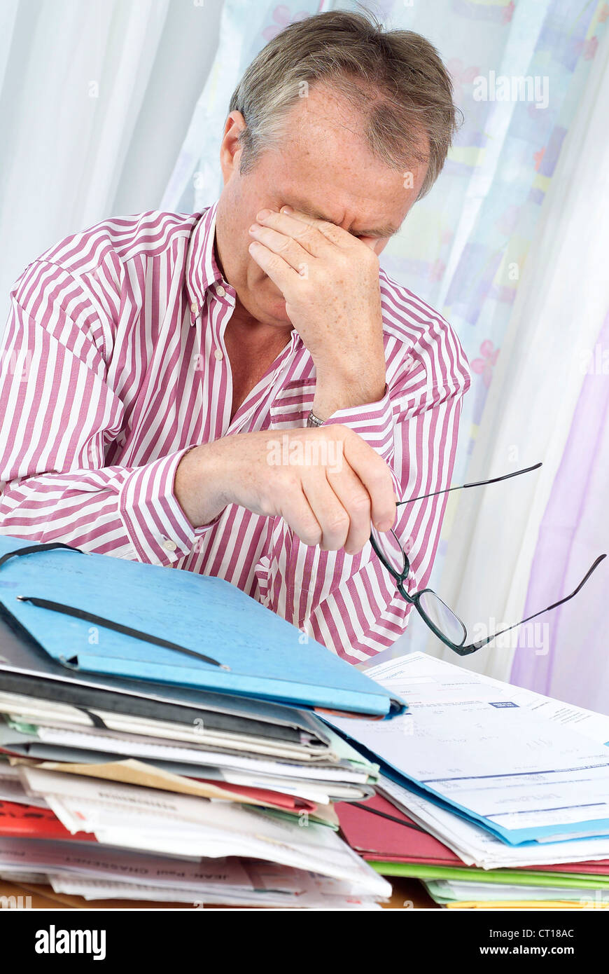 TIRED ELDERLY PERSON Stock Photo - Alamy