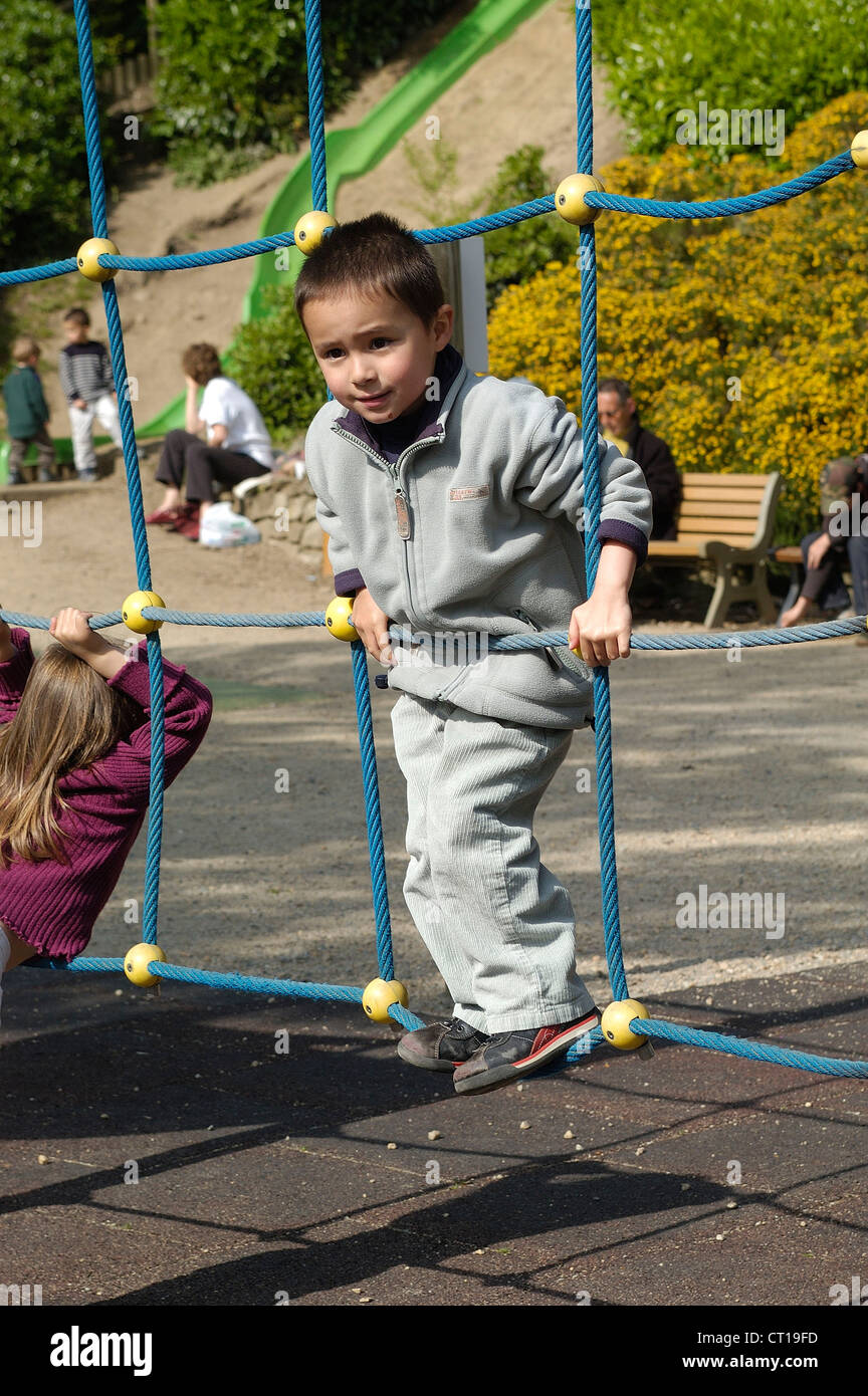 CHILD PLAYING OUTDOORS Stock Photo - Alamy