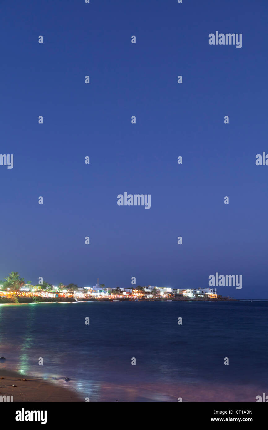 View over the seafront of Dahab at night, Egypt Stock Photo - Alamy