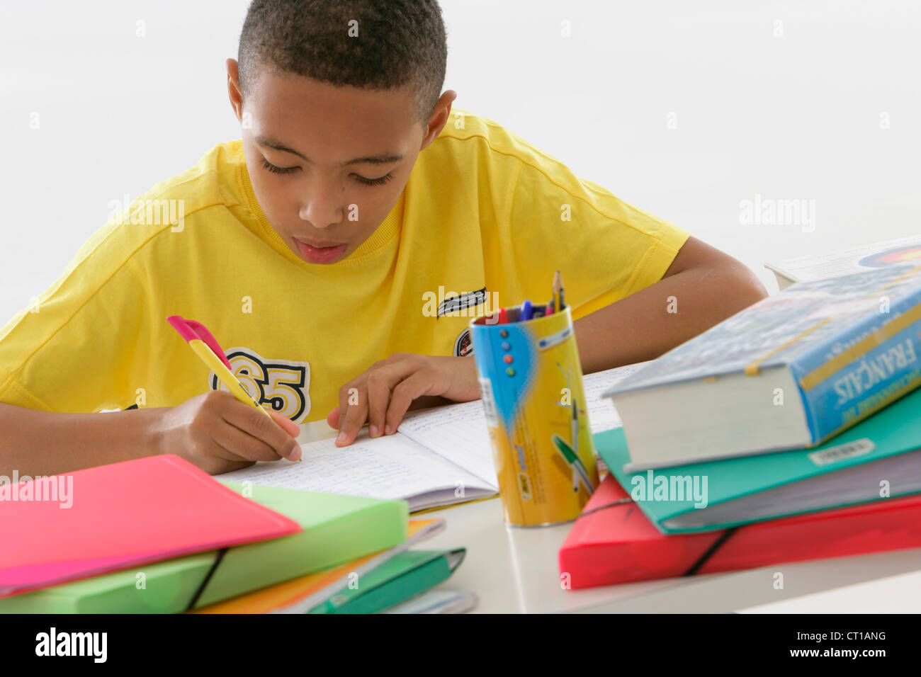 CHILD DOING HOMEWORK Stock Photo - Alamy
