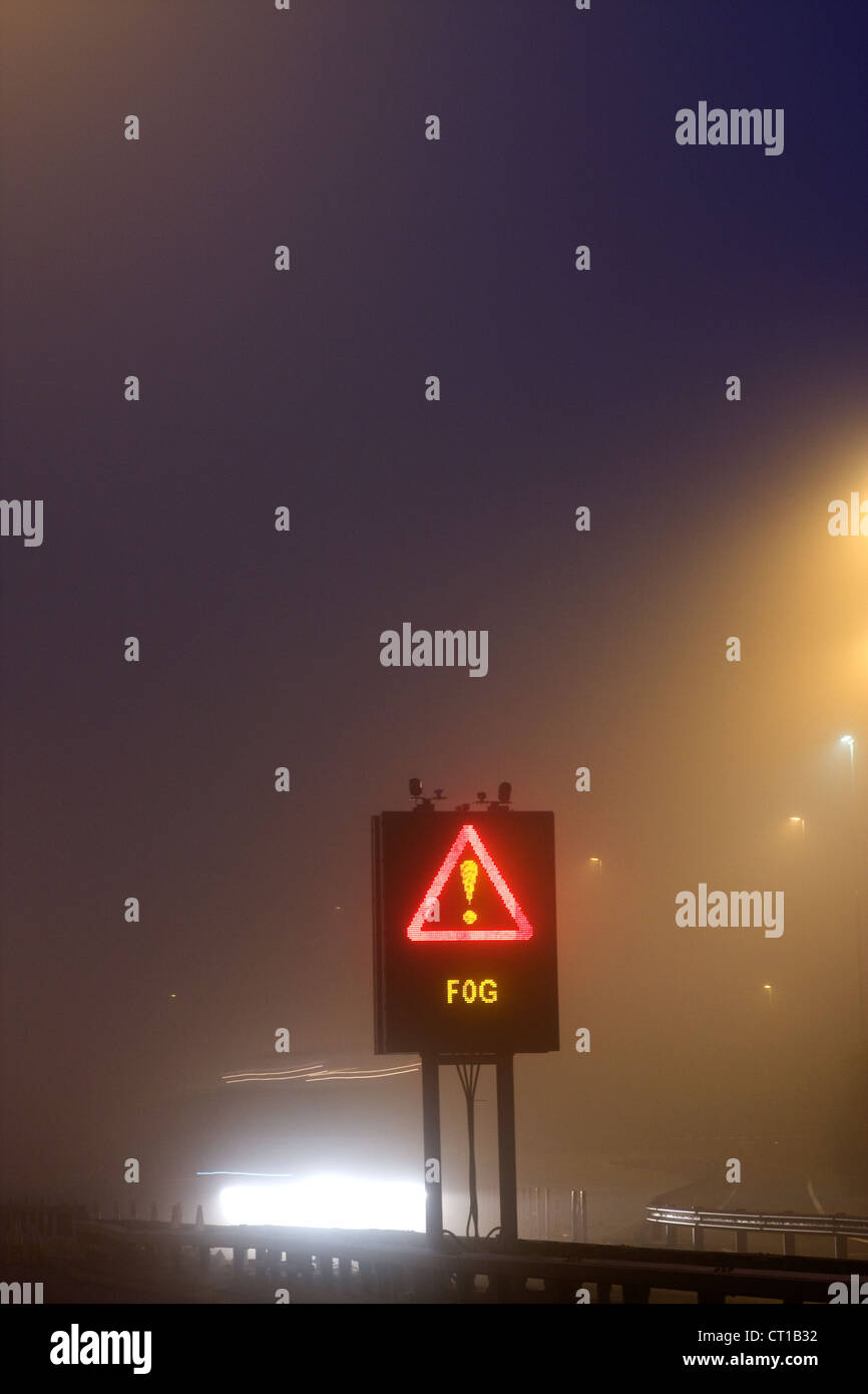 Fog sign on raod Stock Photo - Alamy