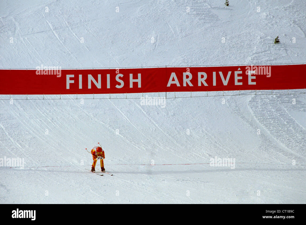 Skier arrives at the finish line Stock Photo - Alamy