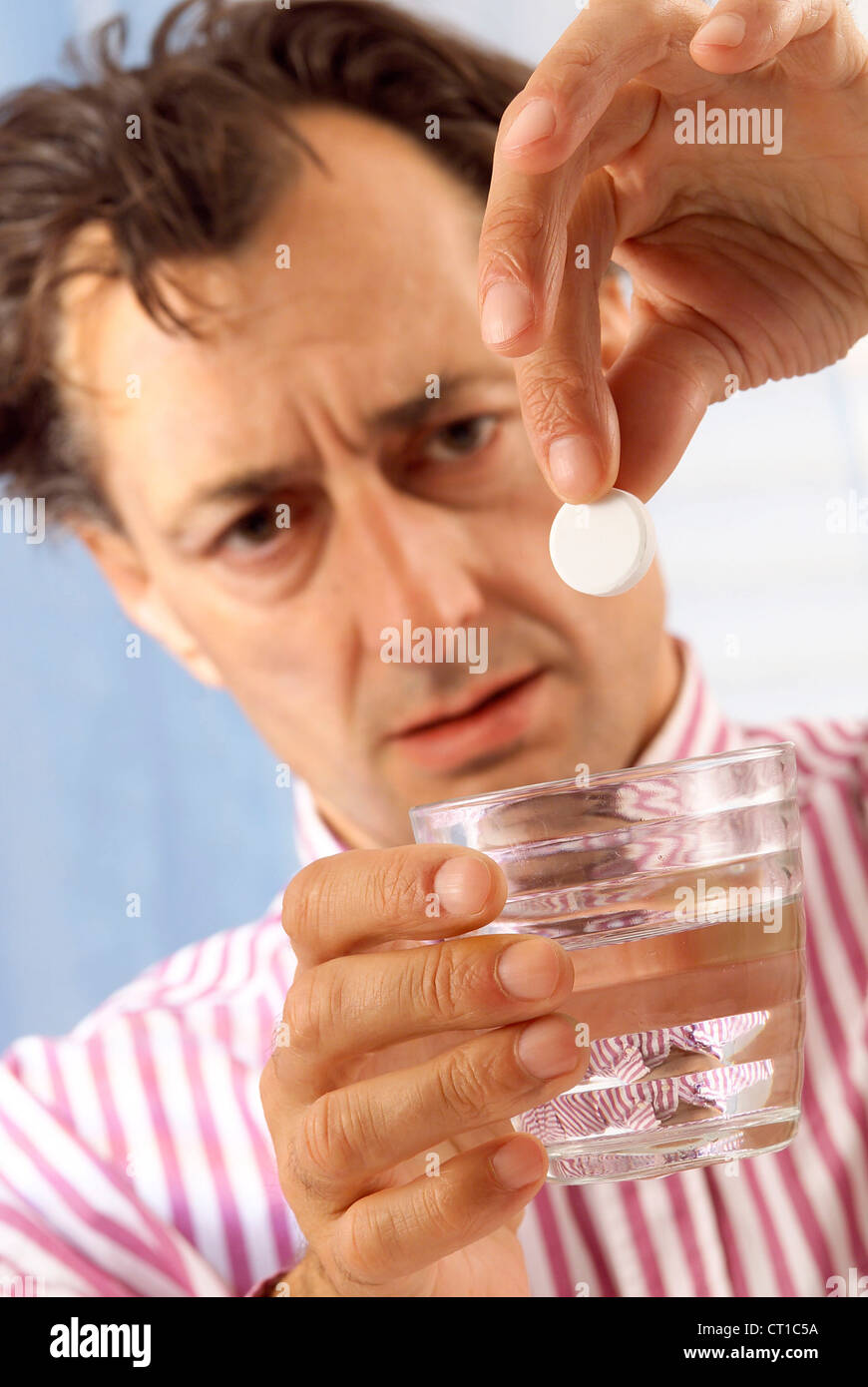 MAN TAKING MEDICATION Stock Photo - Alamy